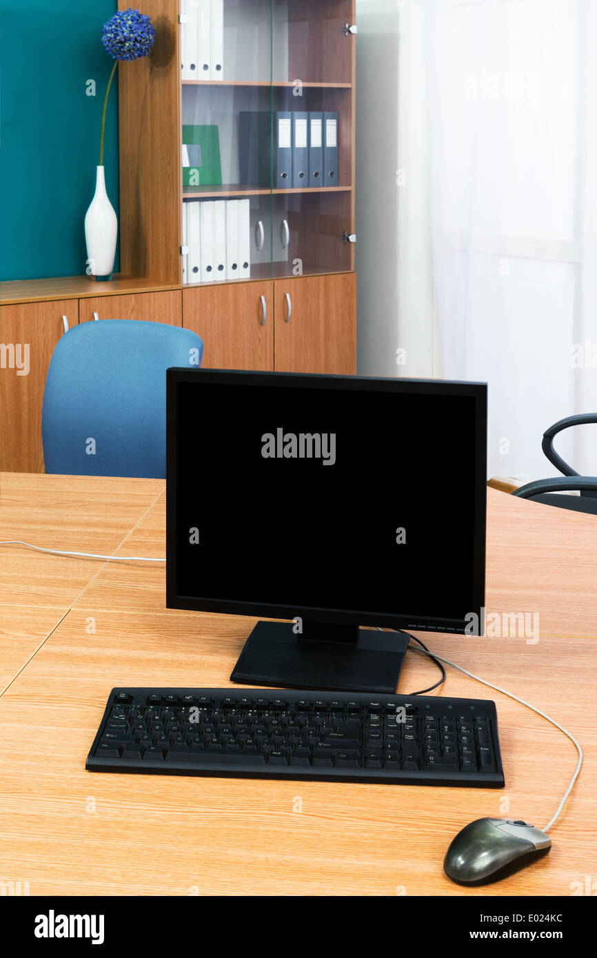 computer on a desk in a modern office Stock Photo - Alamy