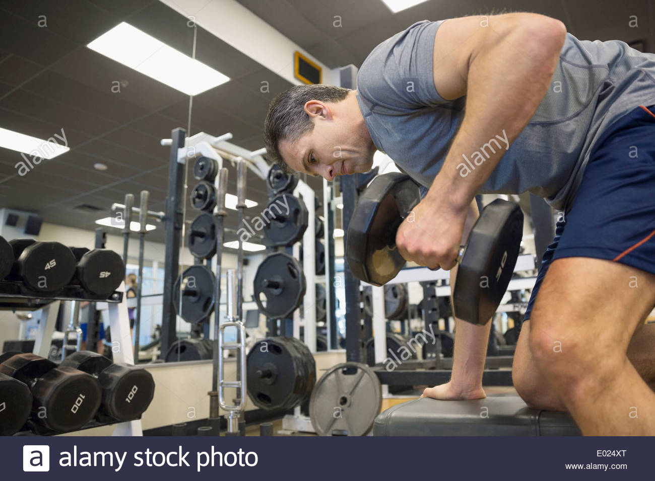Man lifting weight hi-res stock photography and images - Alamy