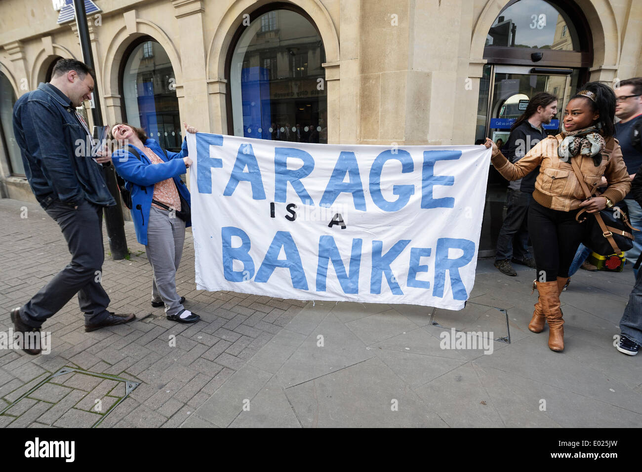 Protesters hold banner in hi-res stock photography and images - Alamy