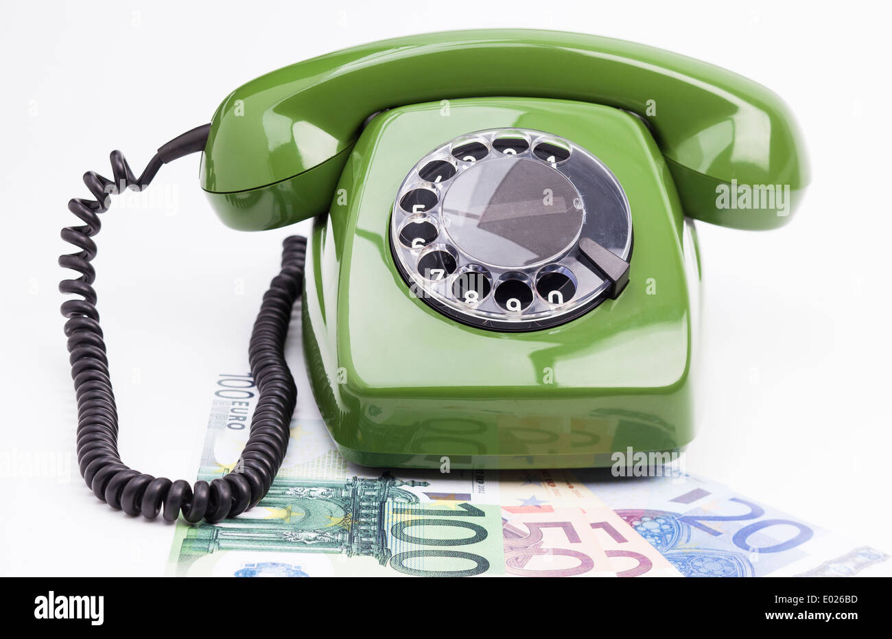 Telephone and money Stock Photo - Alamy