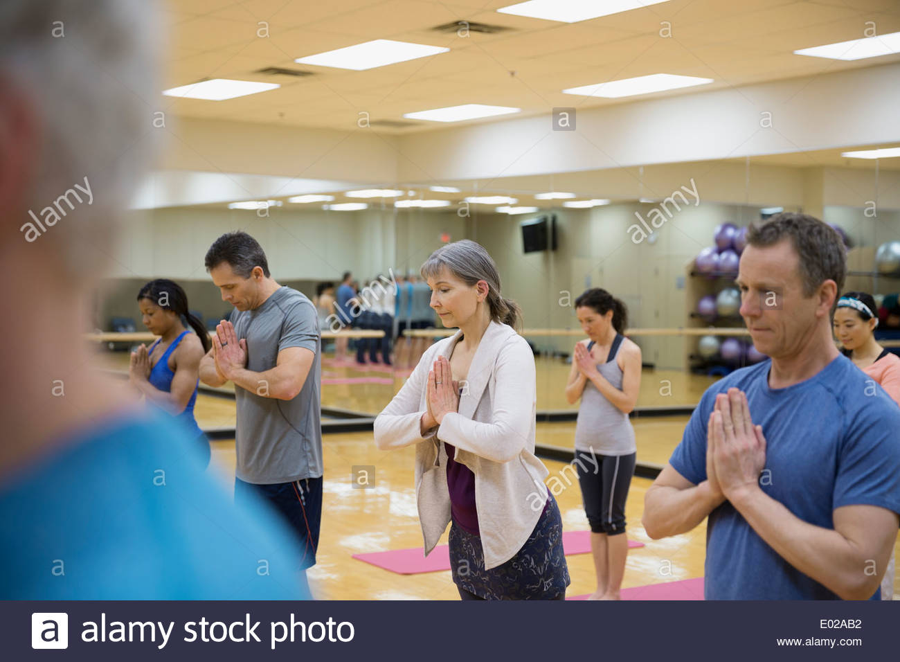 Yoga prayer position hi-res stock photography and images - Alamy