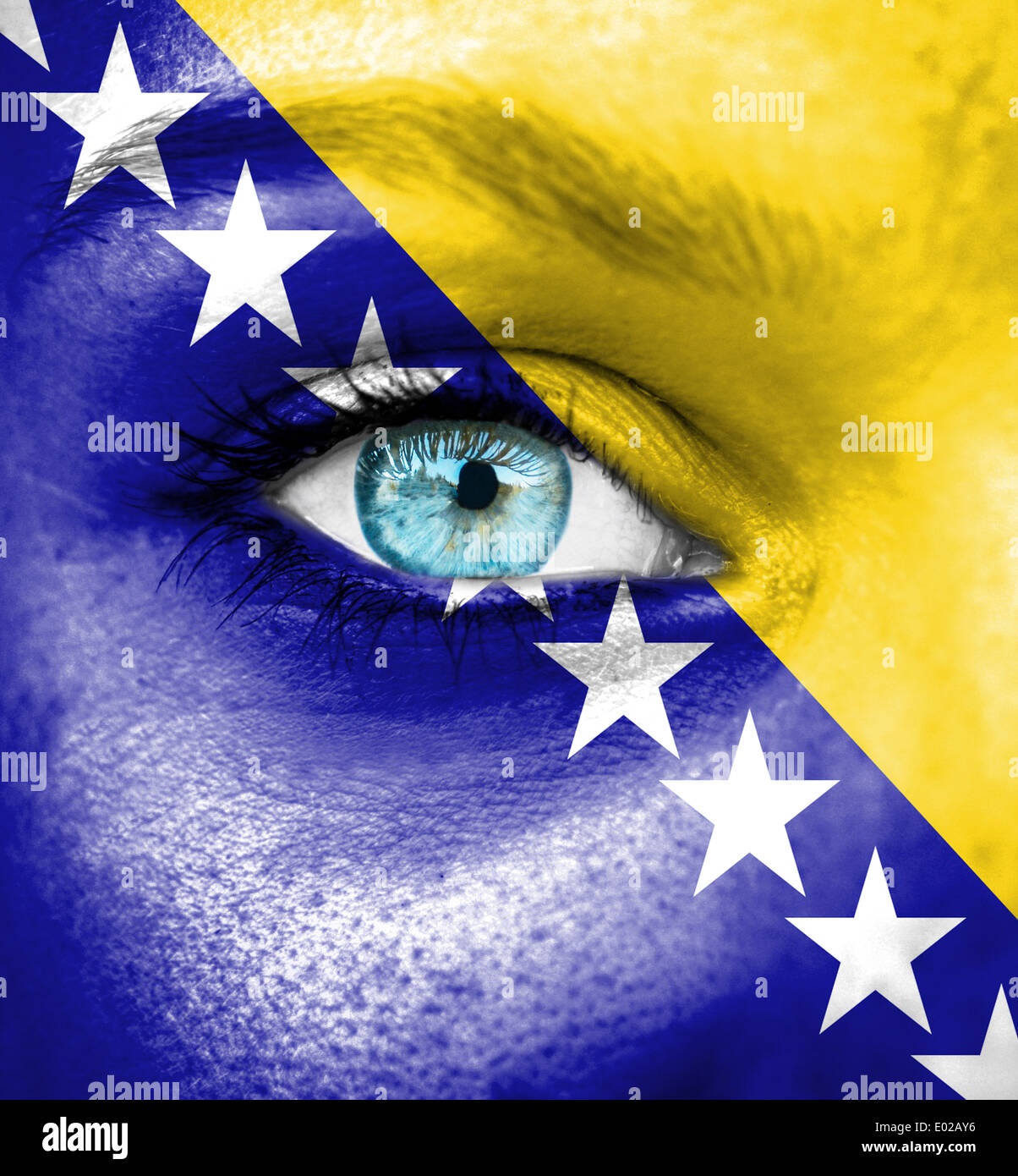Woman face painted with flag of Bosnia and Herzegovina Stock Photo - Alamy