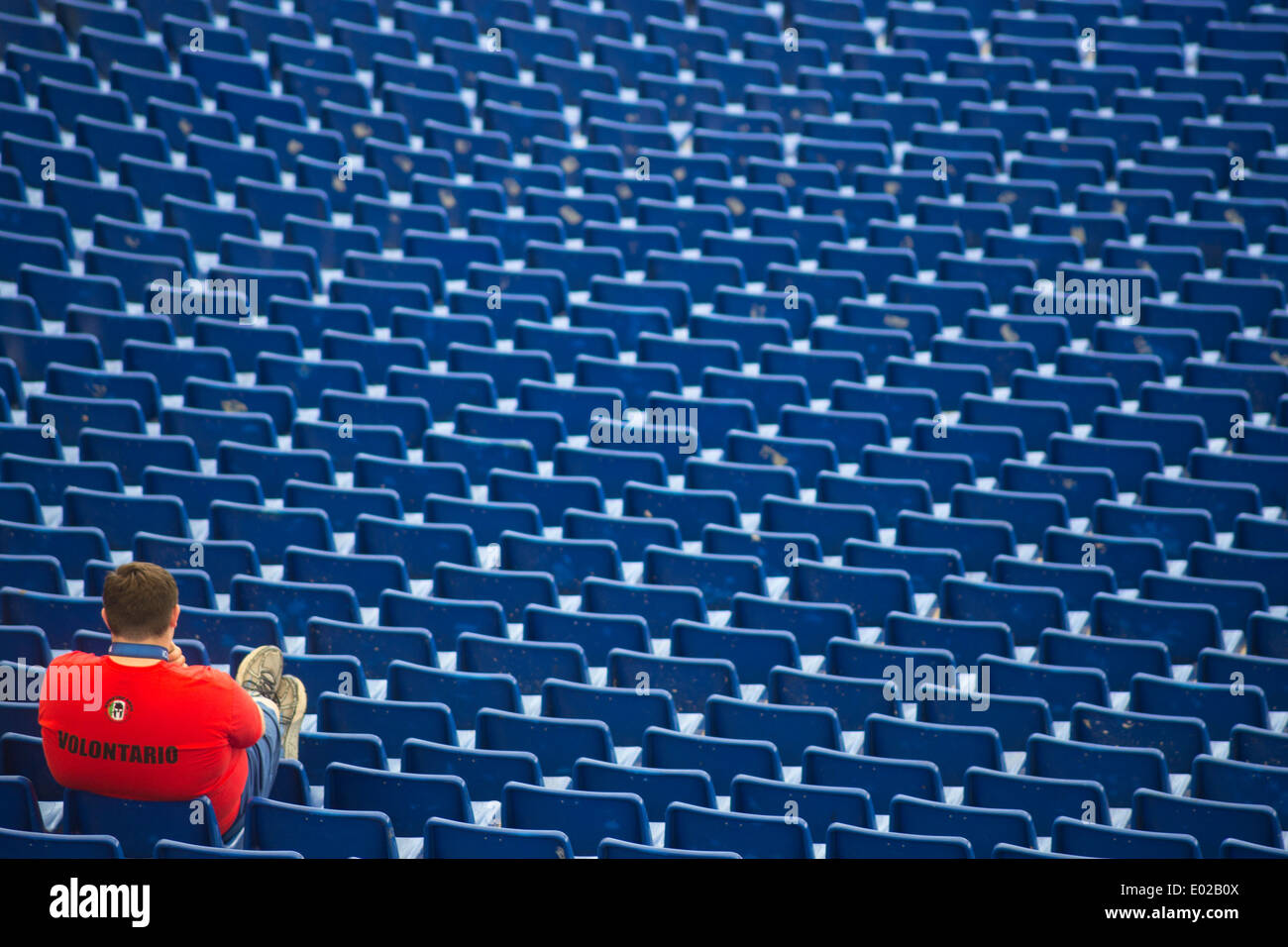 Volunteer in red T-shirt in an empty Olympic Stadium (Rome, Italy Stock ...