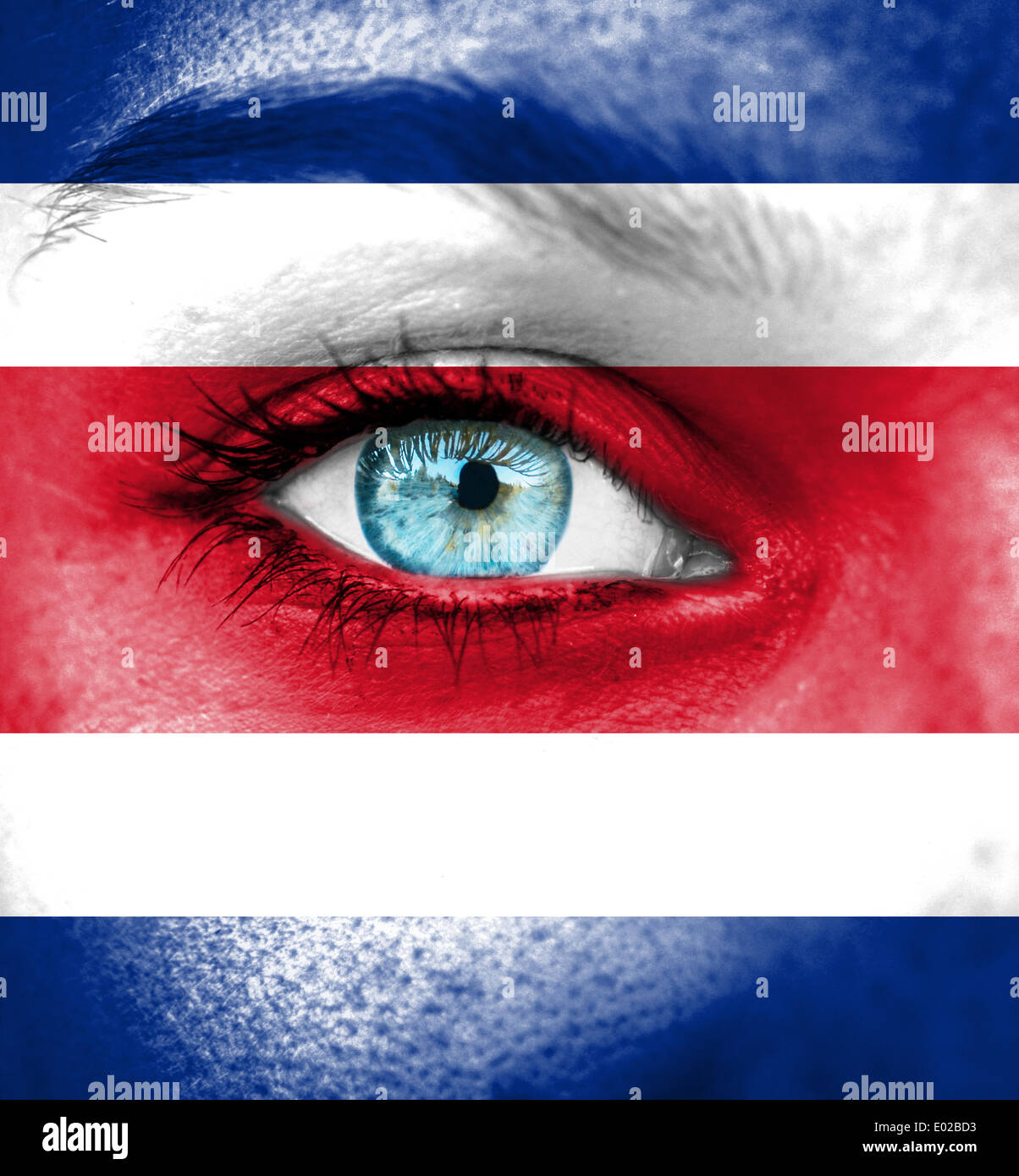 Woman face painted with flag of Costa Rica Stock Photo - Alamy