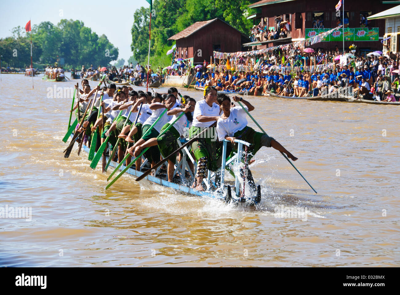 Female leg-rowing boat racing during the Inle Lake Festival at Nyaung ...