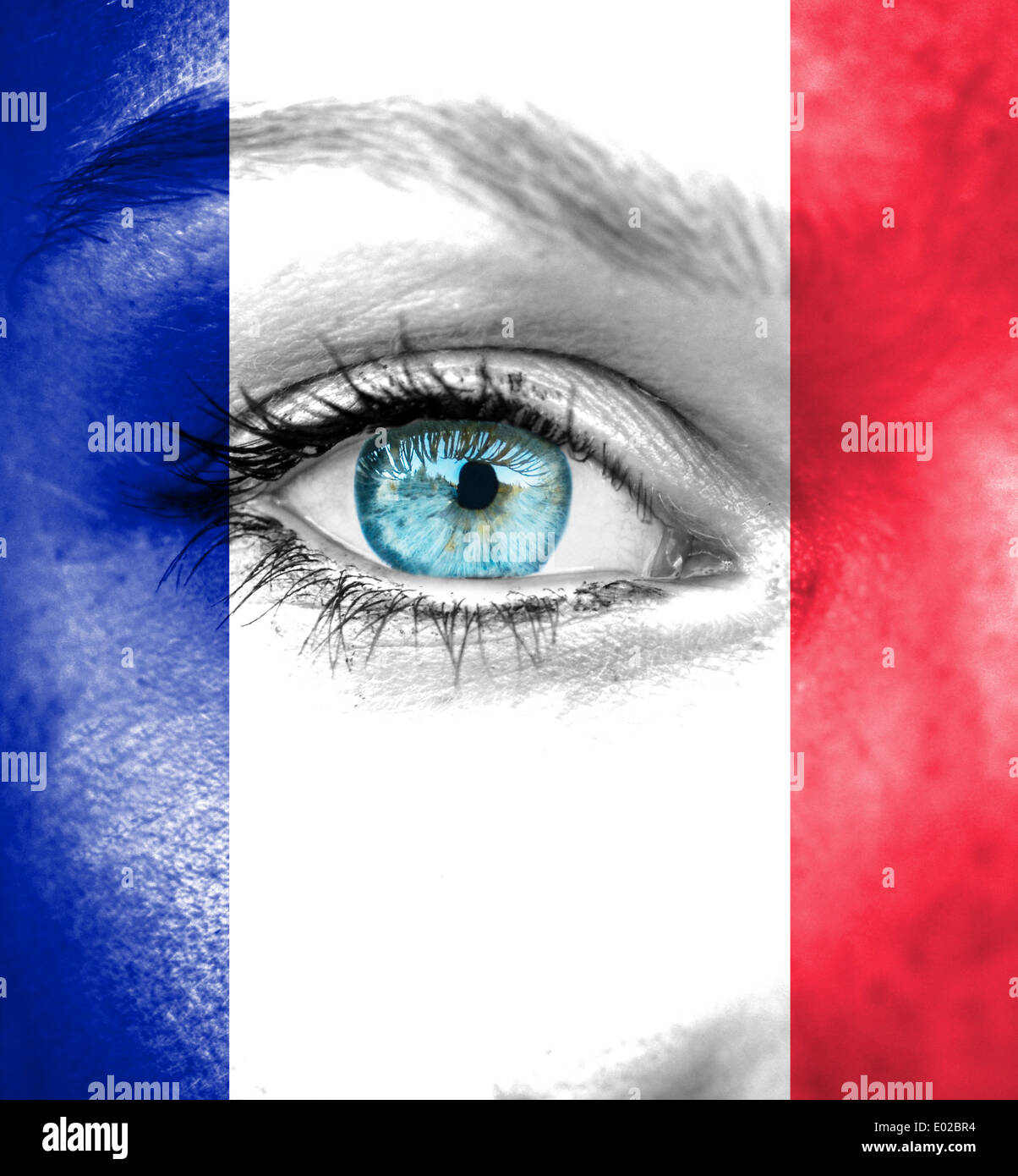 Woman face painted with flag of France Stock Photo - Alamy