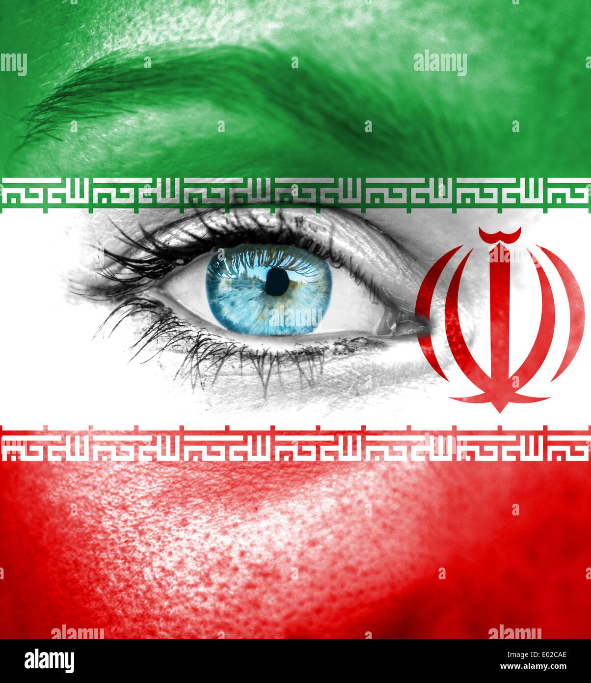 Woman face painted with flag of Iran Stock Photo - Alamy