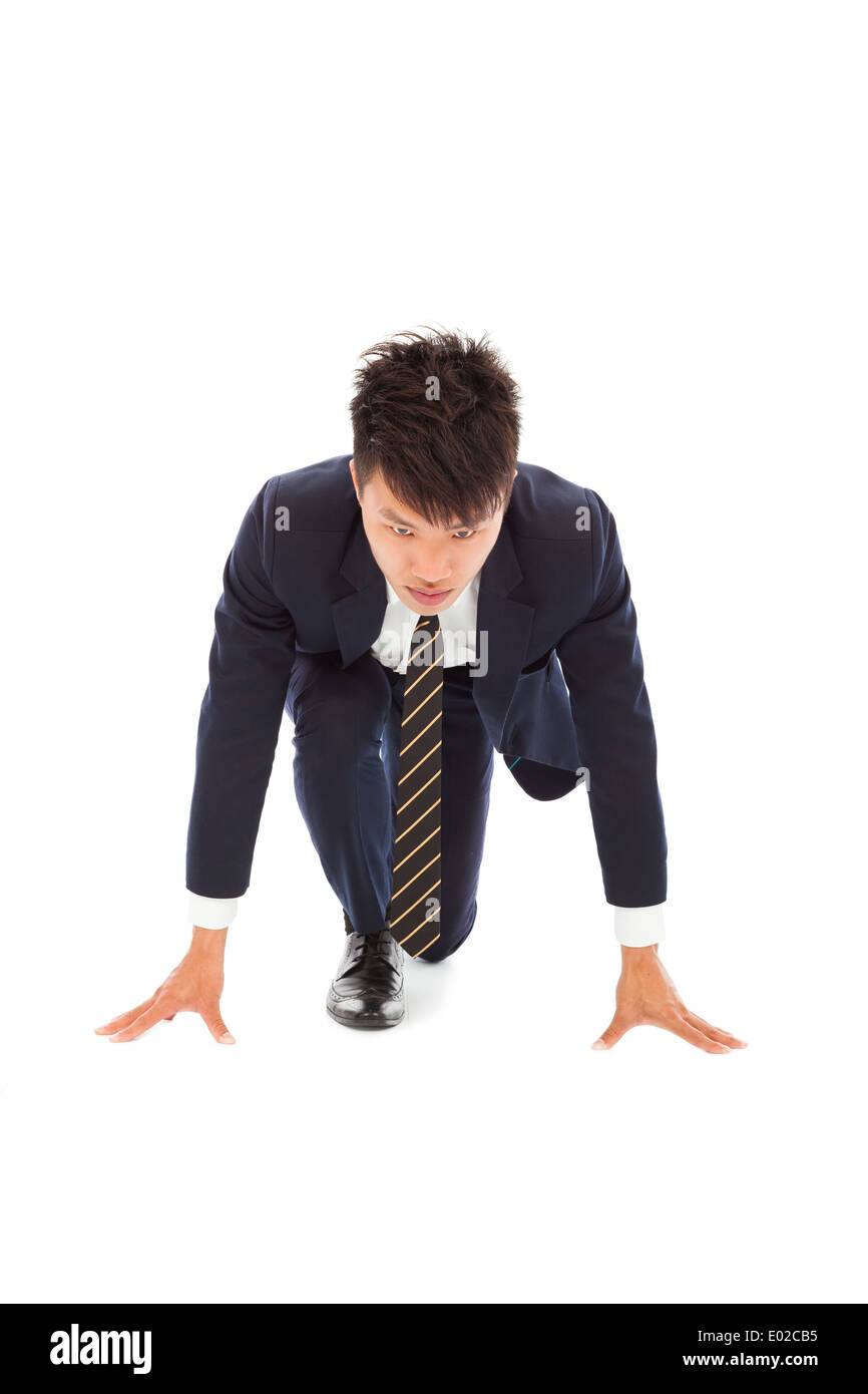 businessman make a running pose Stock Photo - Alamy