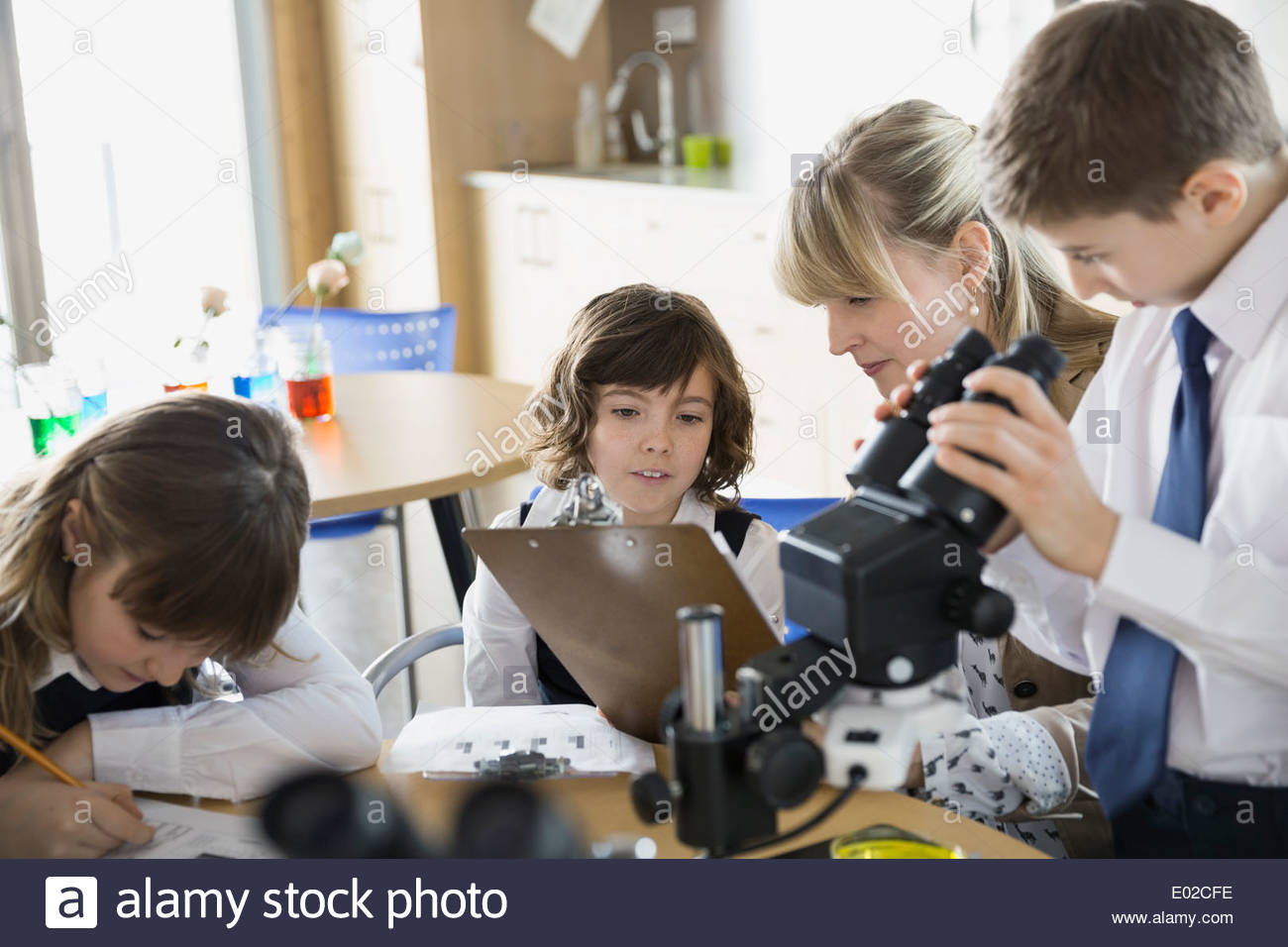 Elementary students talking classroom hi-res stock photography and ...