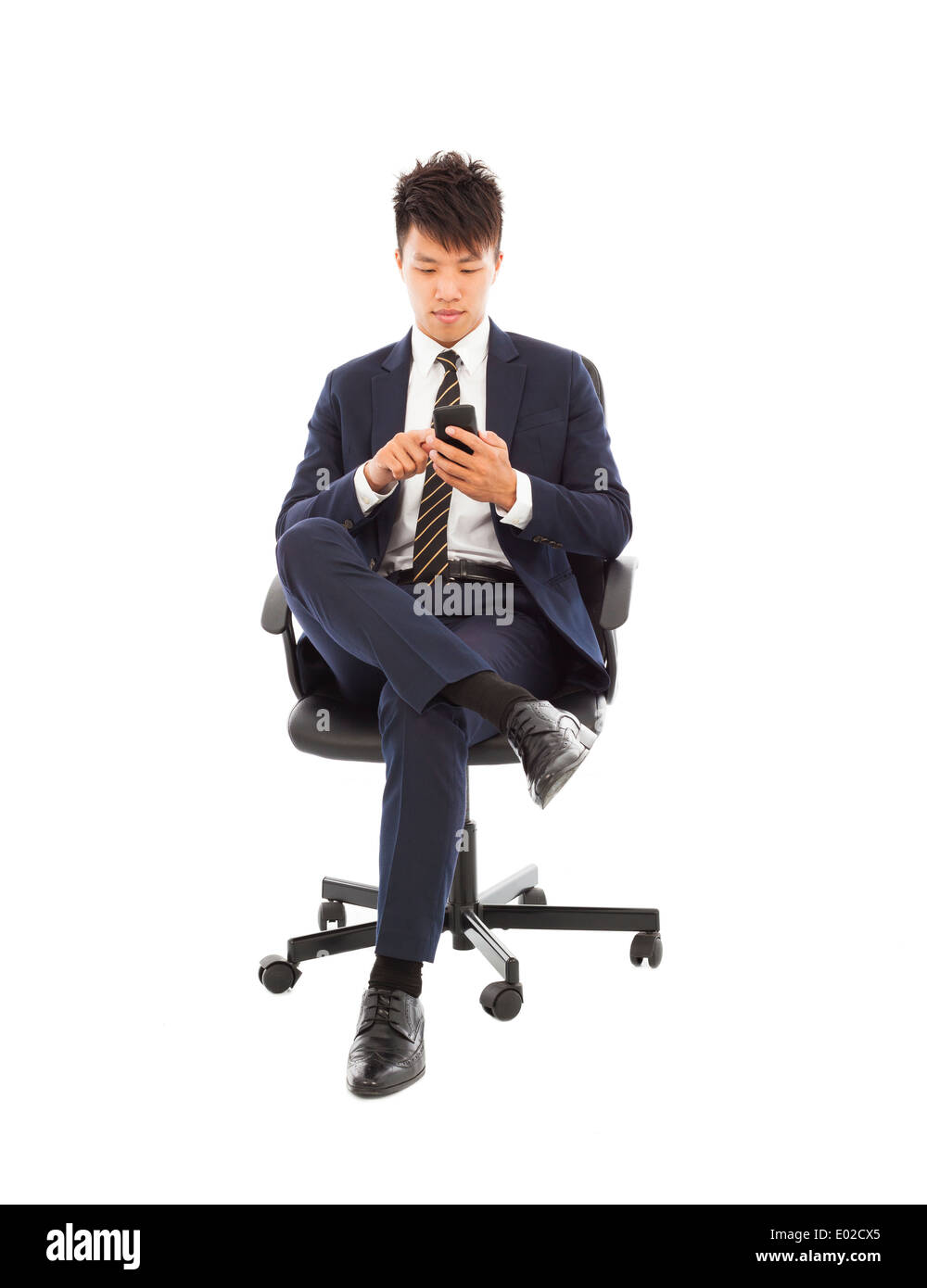 Office worker posing on chair Cut Out Stock Images & Pictures - Alamy