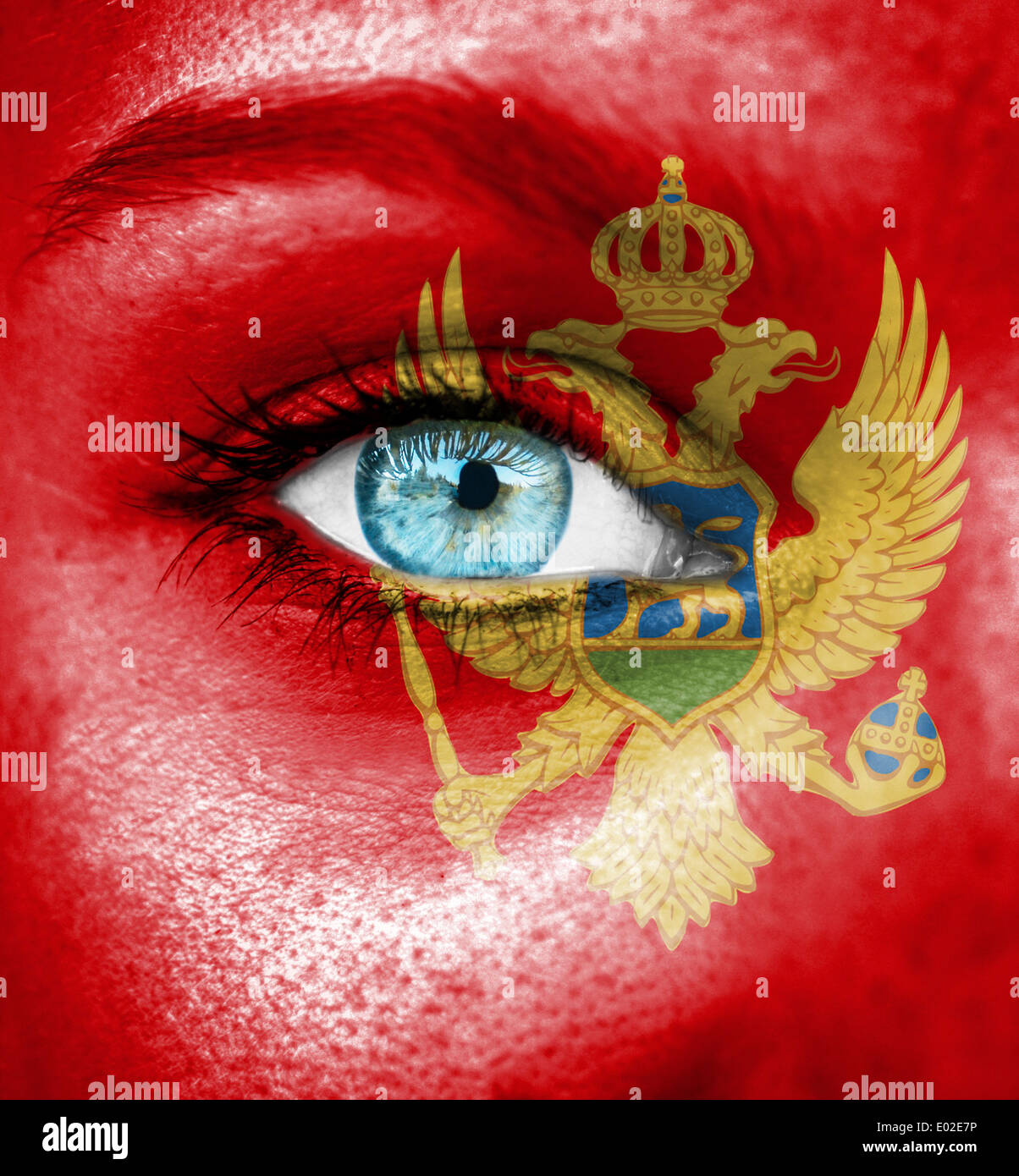 Woman face painted with flag of Montenegro Stock Photo - Alamy