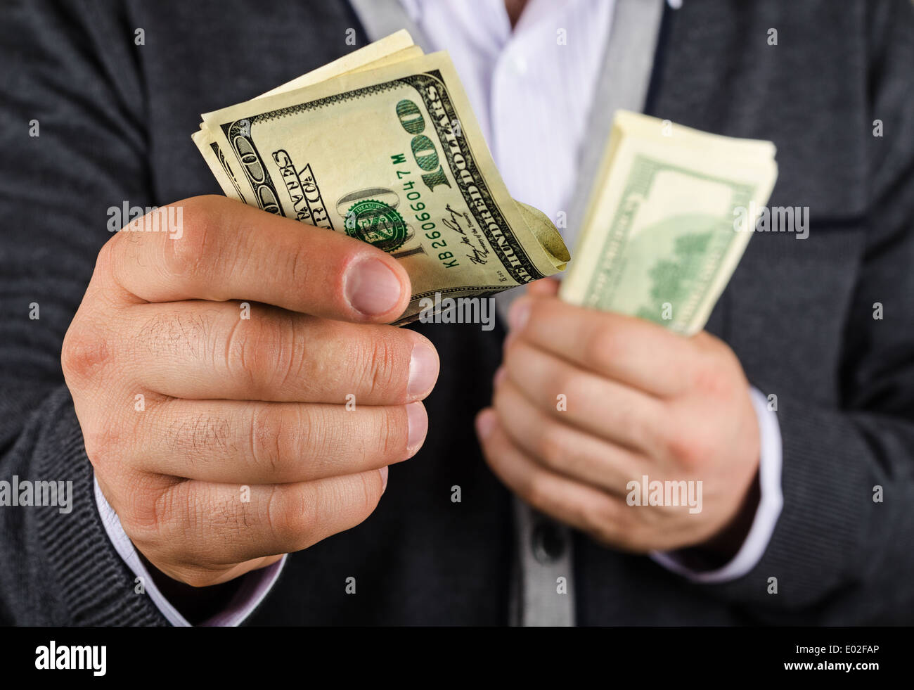 Man handing money hi-res stock photography and images - Alamy