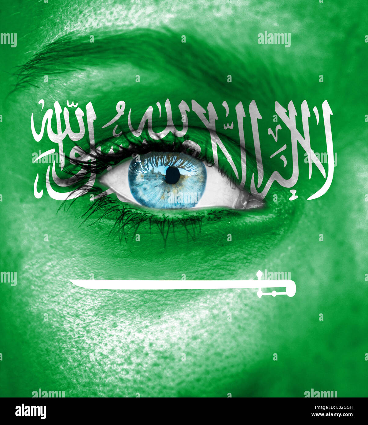 Woman face painted with flag of Saudi Arabia Stock Photo - Alamy