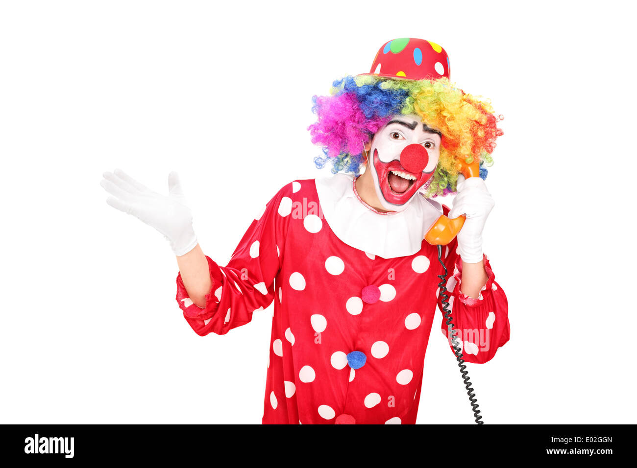 Male clown talking on a vintage telephone Stock Photo - Alamy