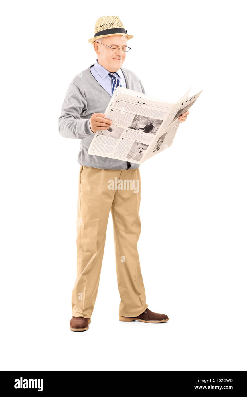Senior gentleman reading a newspaper Stock Photo - Alamy