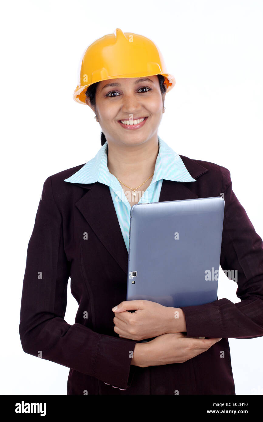 Young Indian female engineer with tablet against white background Stock ...