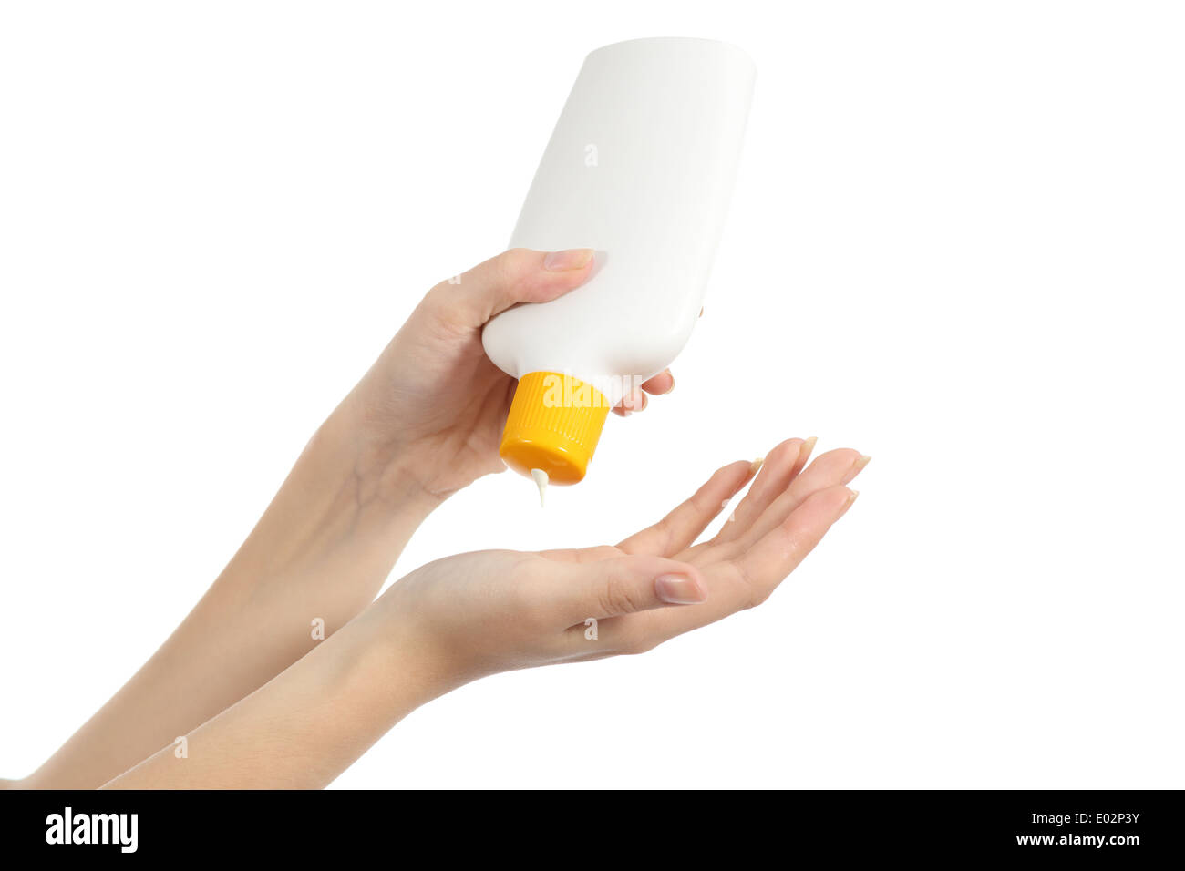 Hands applying sunscreen protection from a bottle isolated on white ...
