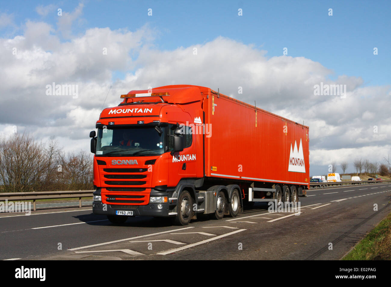 A 'Mountain Transport' truck traveling along the A46 dual carriageway ...