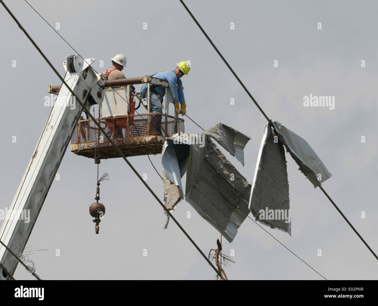April 29, 2014. Pearl, Mississippi, U.S. - Power line crews remove ...