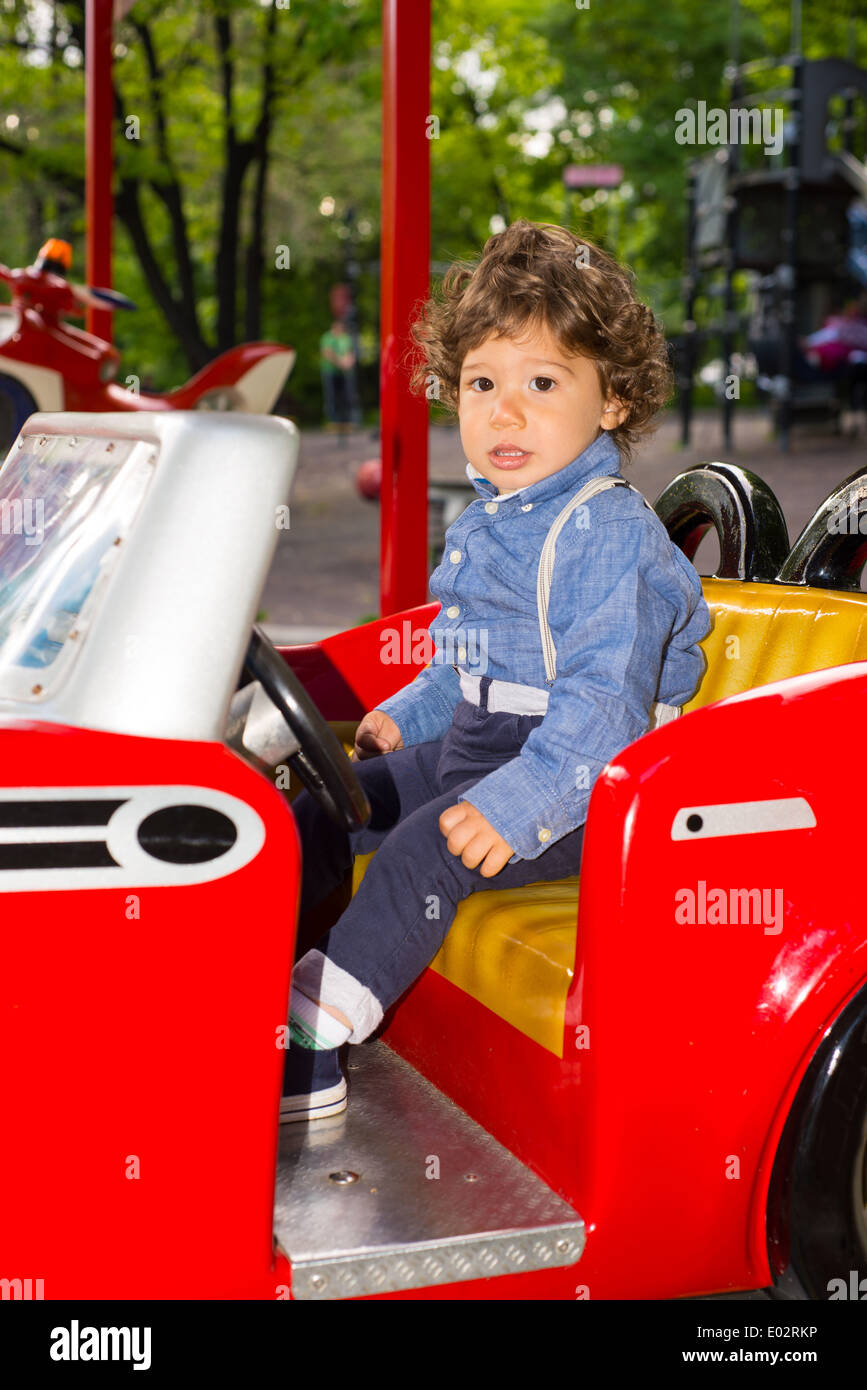 Boy riding in toy car hi-res stock photography and images - Alamy