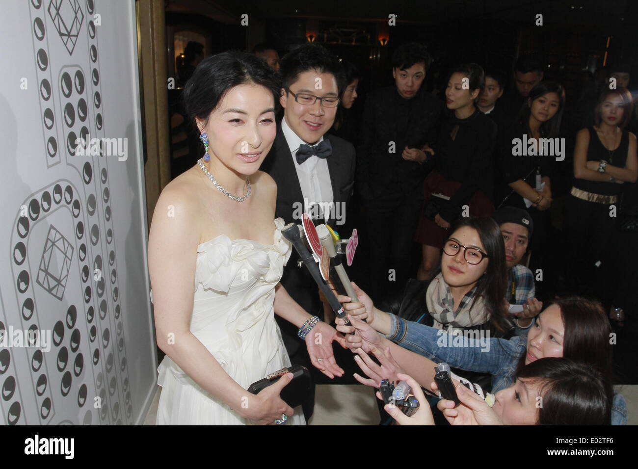Hong Kong, China. 25th Apr, 2014. Kenneth Fok and wife Guo Jingjing ...