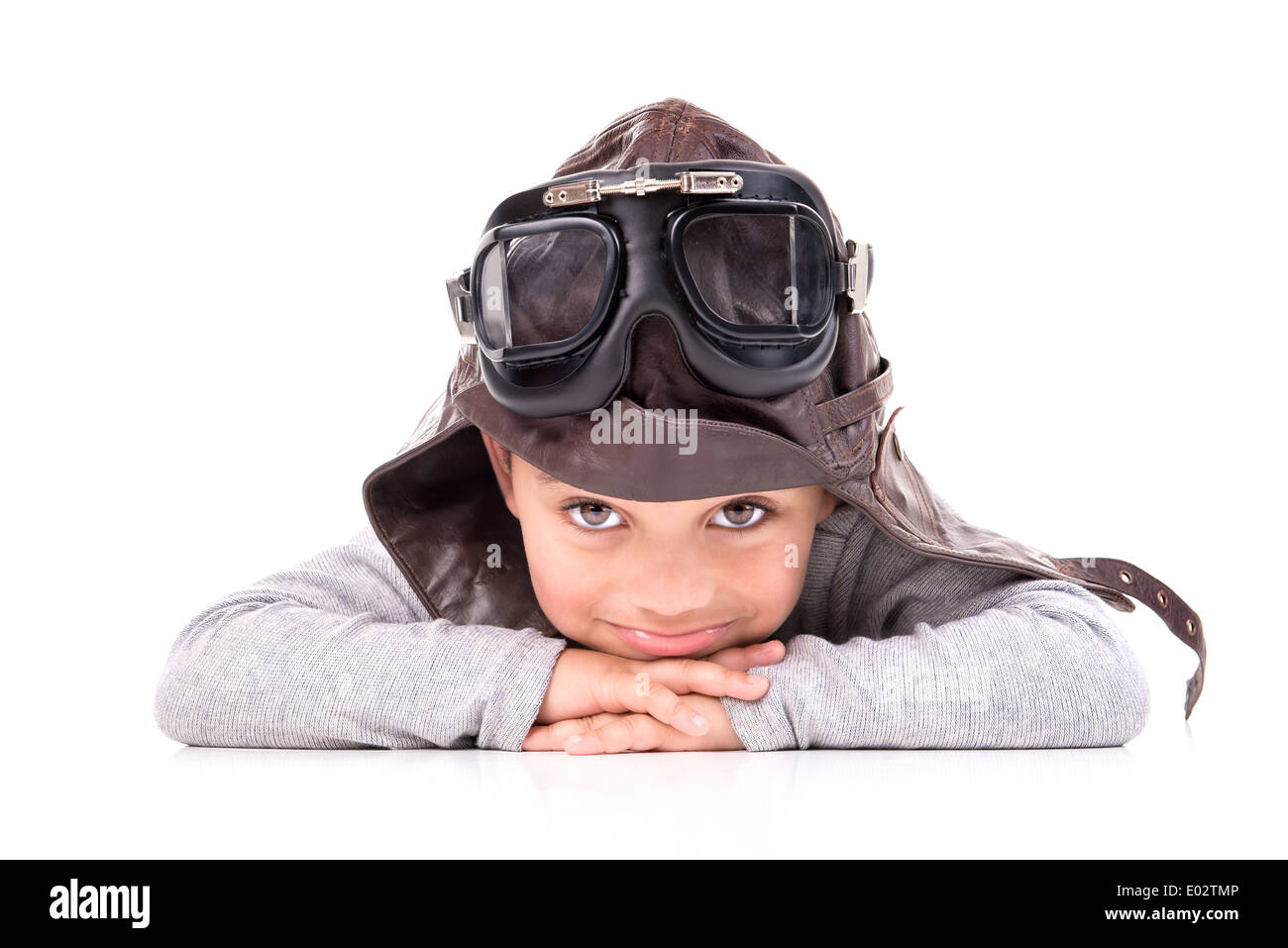 Young boy with pilot helmet isolated in white Stock Photo - Alamy