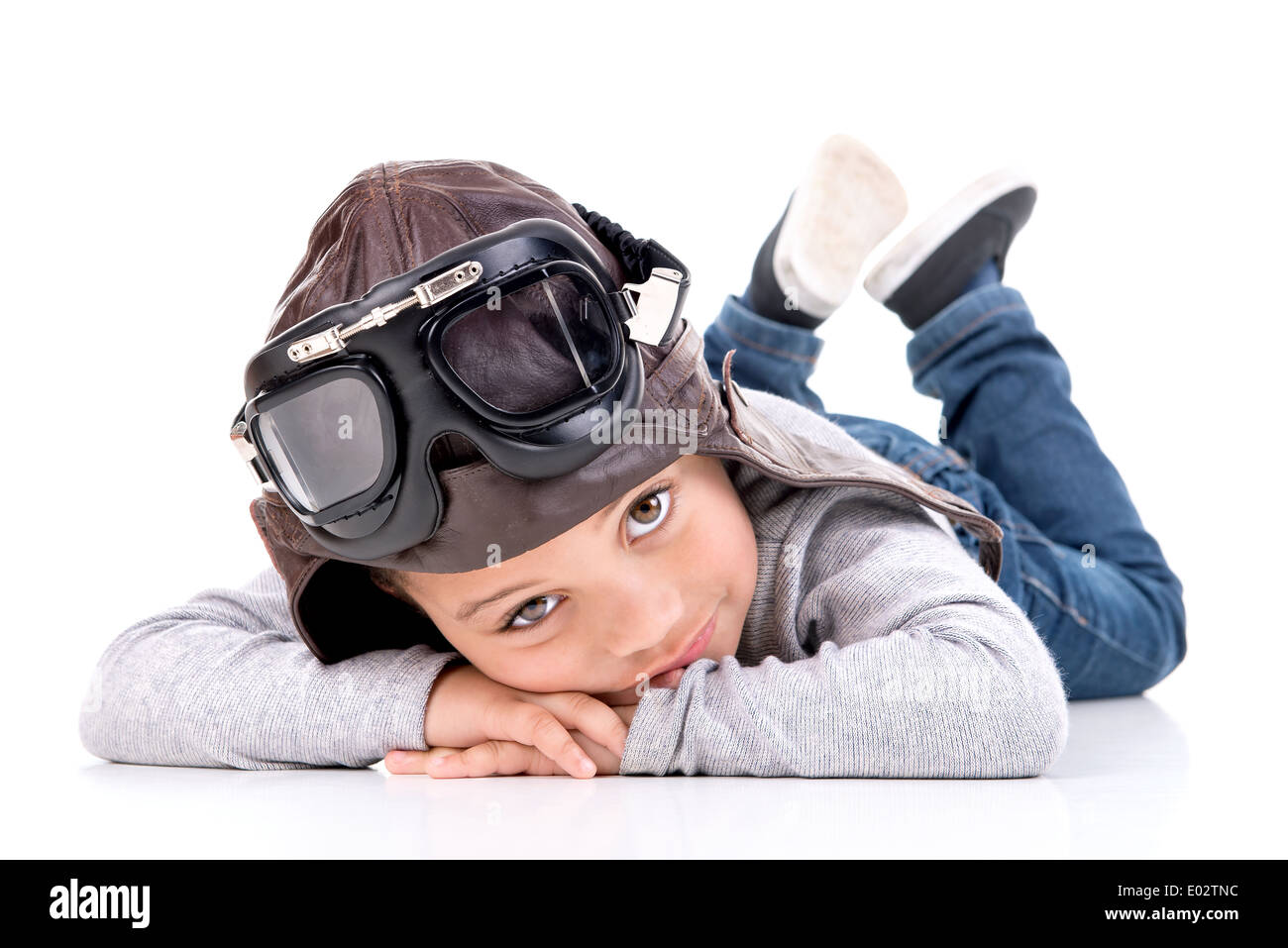 Young boy with pilot helmet isolated in white Stock Photo - Alamy