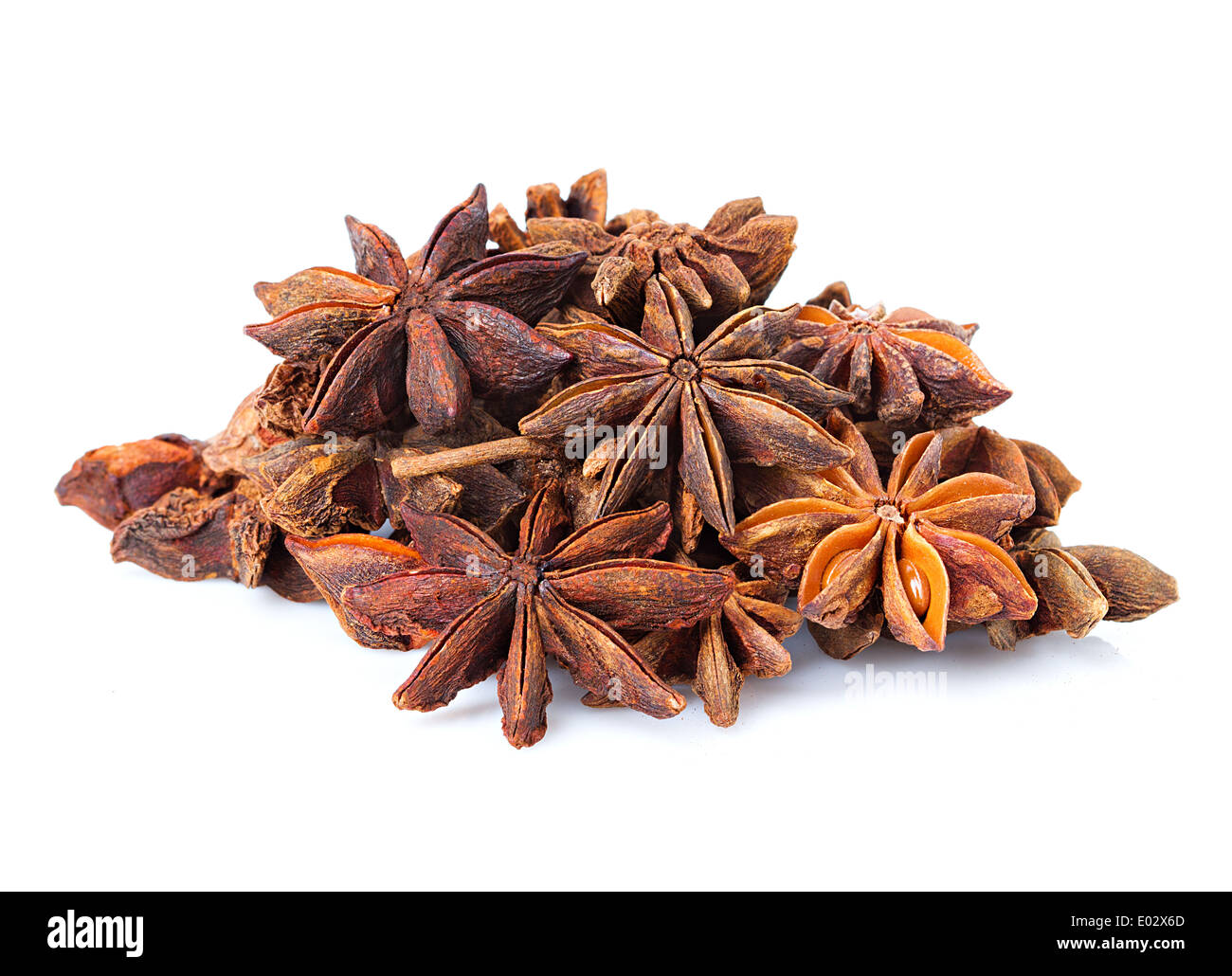Anise stars on a white background Stock Photo - Alamy
