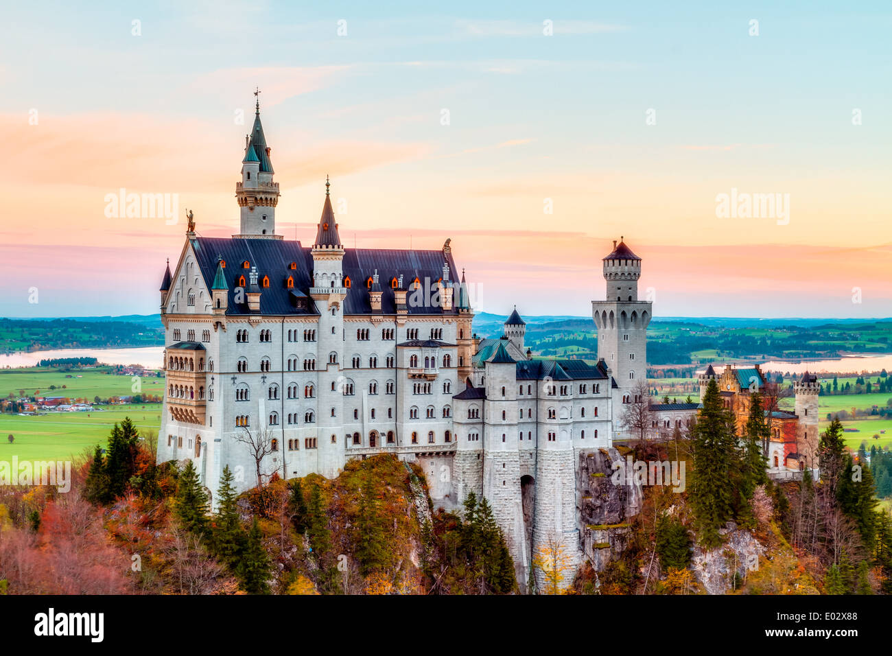 Fairy Tale Castle Neuschwanstein at sunrise in October near Munich ...