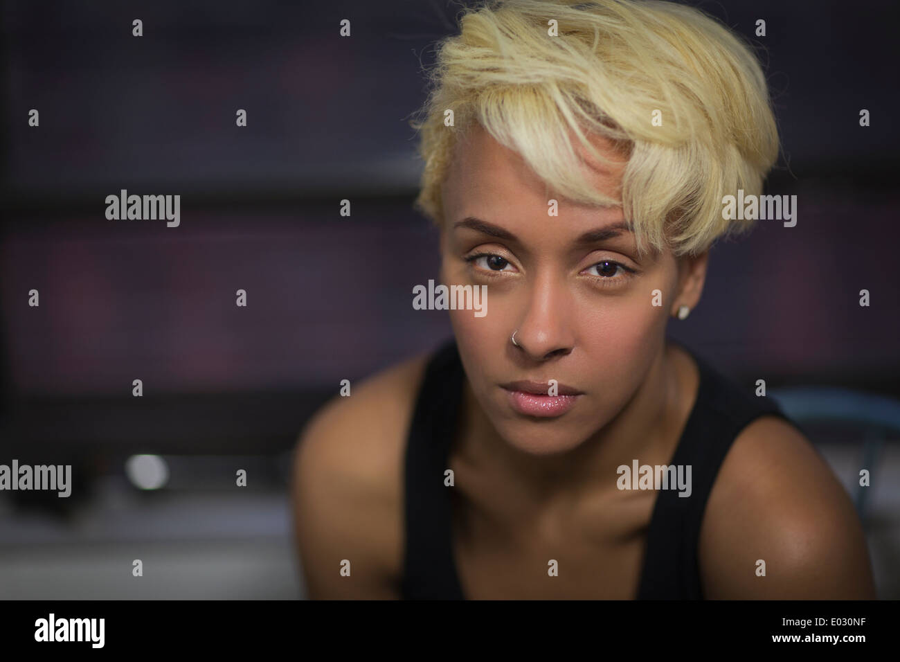 A woman with blonde hair with an anxious expression Stock Photo - Alamy