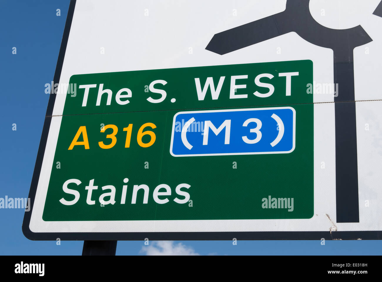 british road sign on approach to roundabout giving directions for the ...