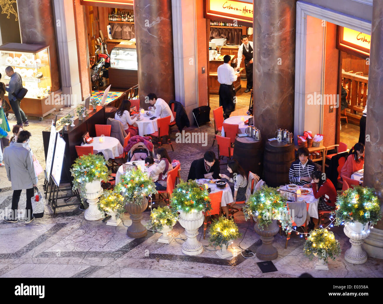 People at a restaurant at Venus Fort, Odaiba, Tokyo, Japan. High angle ...