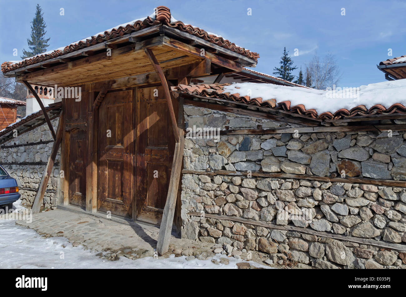 Ancient house with two-leaved wood entrance door in town Koprivshtitsa ...