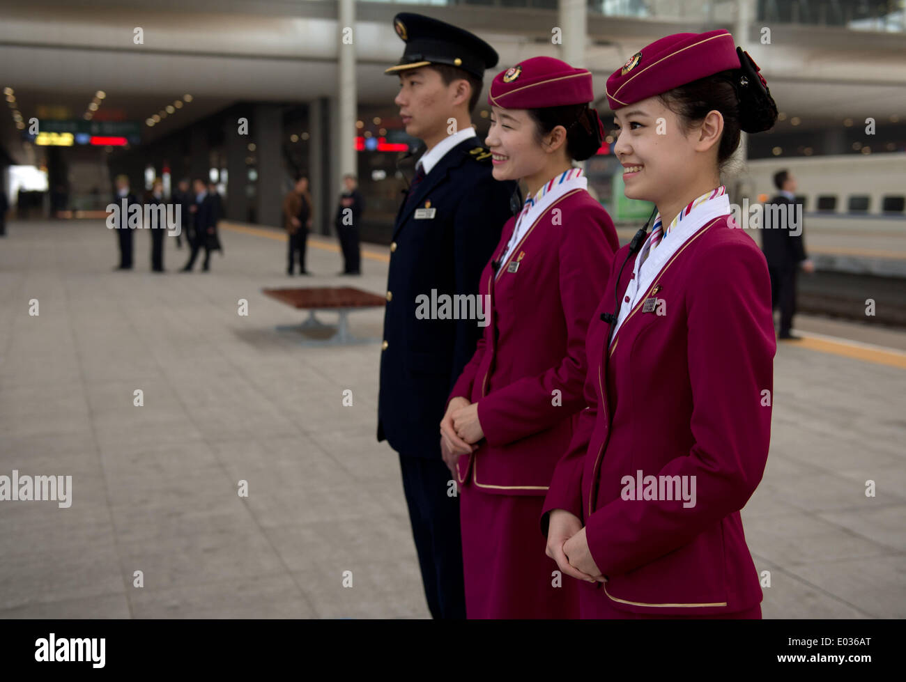 Train attendants stand on a platform at the central station in ...