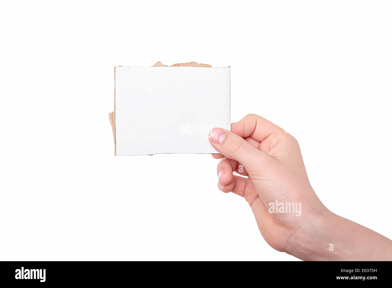 Hand holding piece torn paper hi-res stock photography and images - Alamy