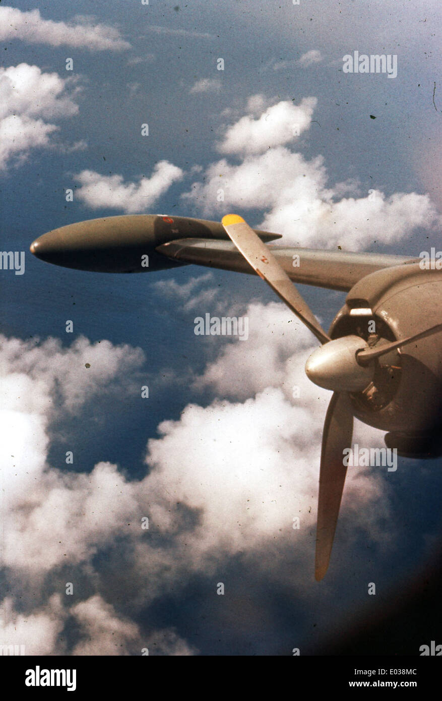 The image captures a WV-2 aircraft with its engine feathered, taken in ...