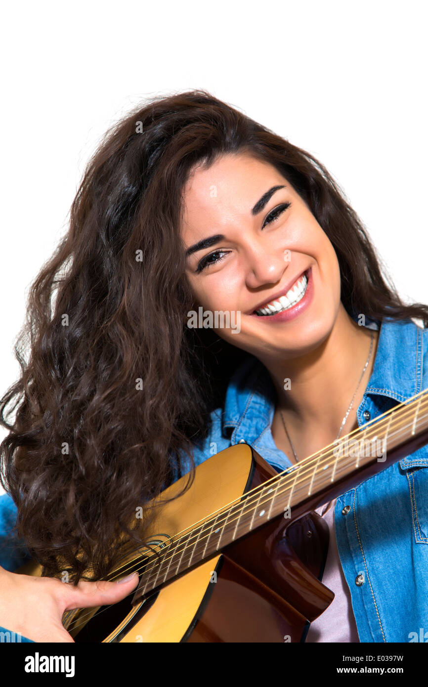 Young woman playing guitar Stock Photo - Alamy