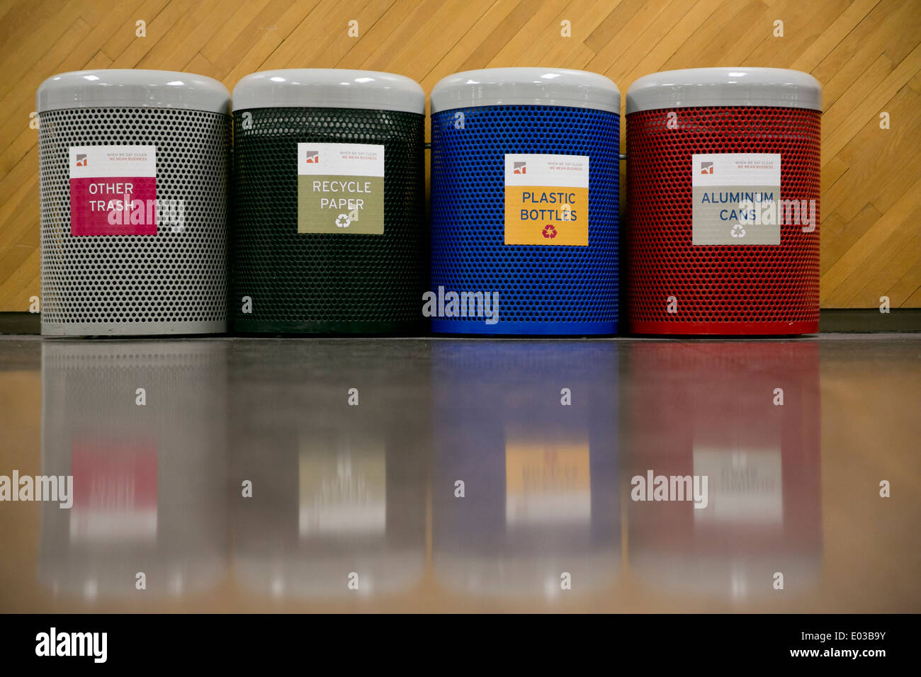 bins located inside University of Texas at Austin building with signs ...