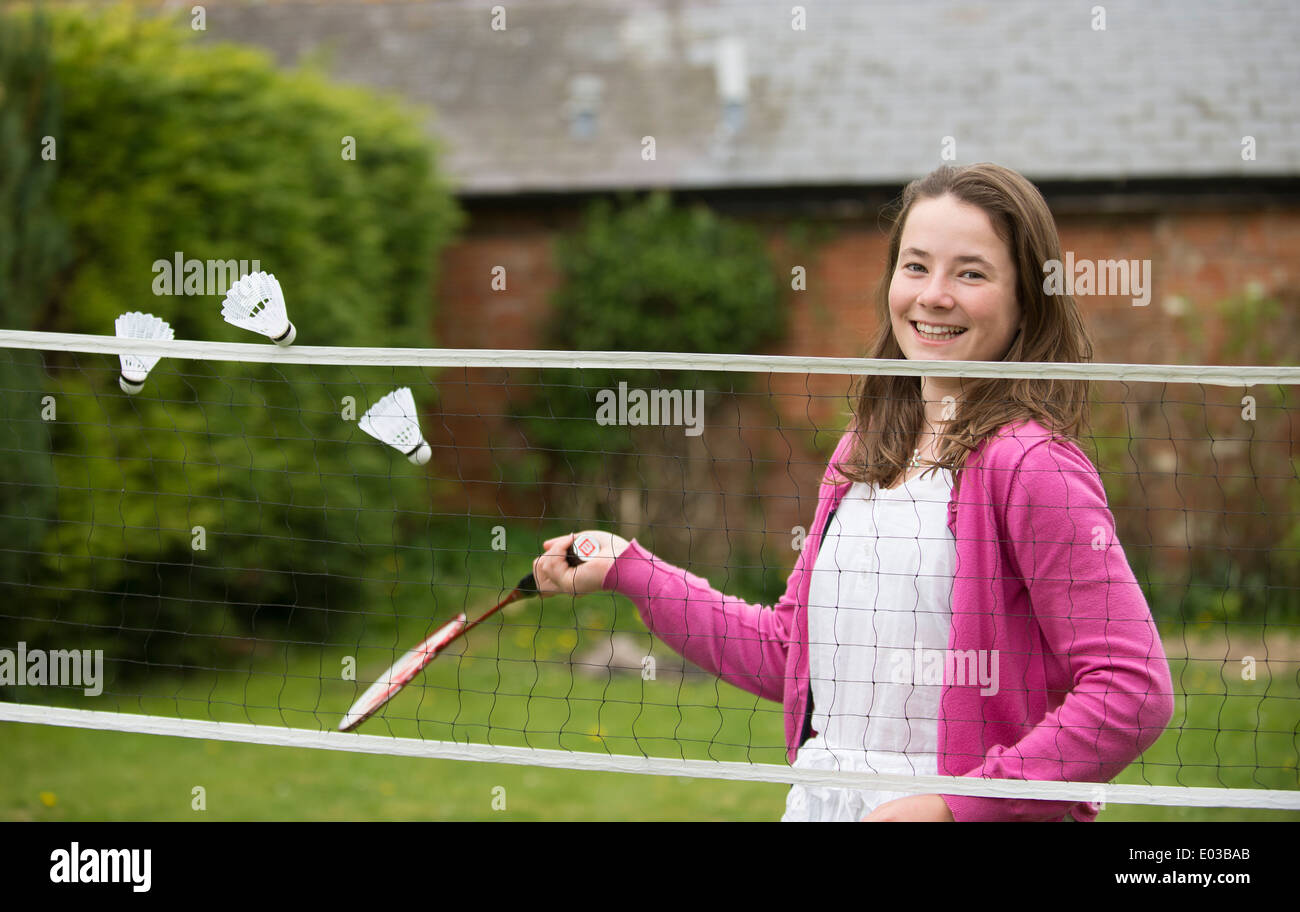 Young girl playing badminton Stock Photo - Alamy