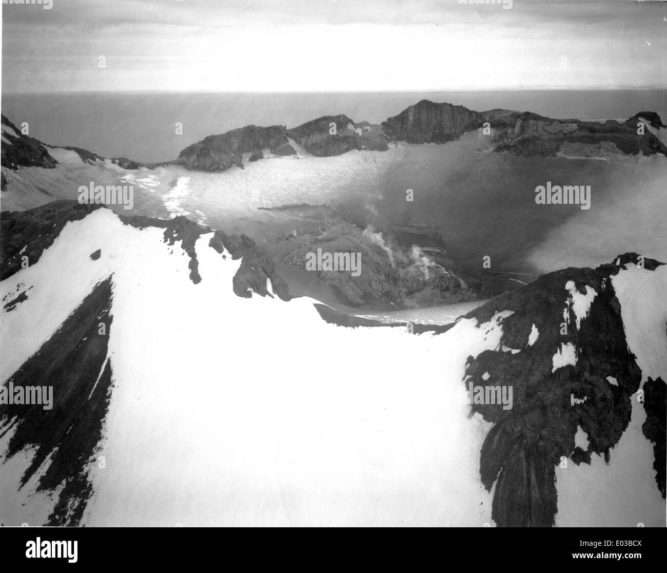 A volcano's crest and its caldera offer a dramatic view of the ...