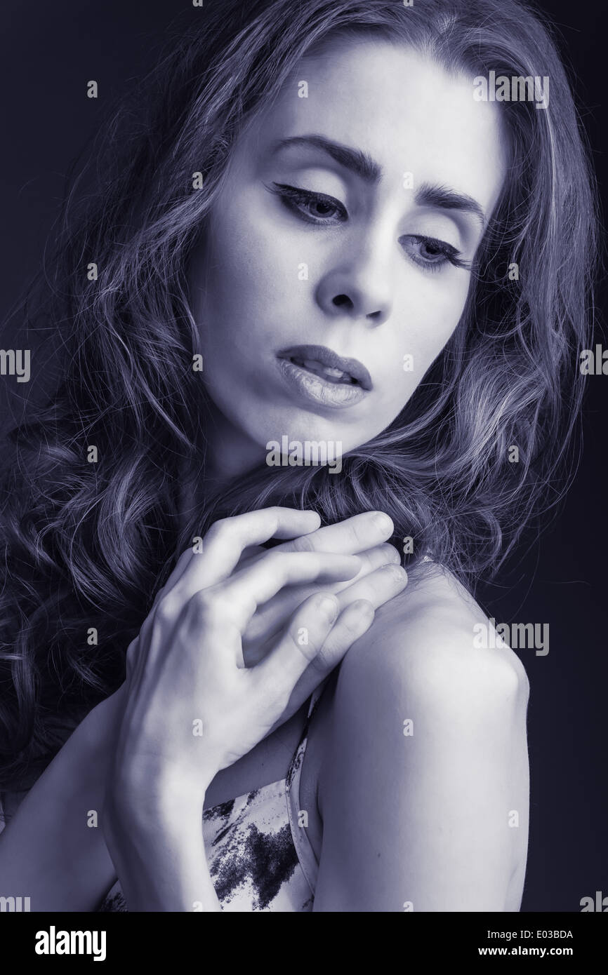 Beautiful tender young woman, tinted blue black and white image Stock ...