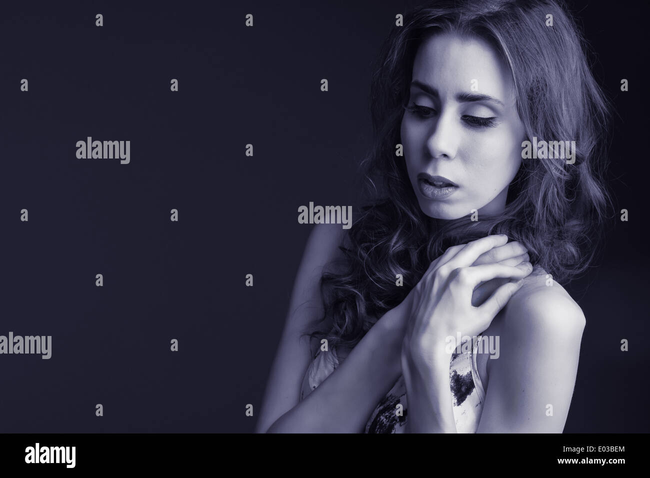 Beautiful tender young woman, tinted blue black and white image Stock ...