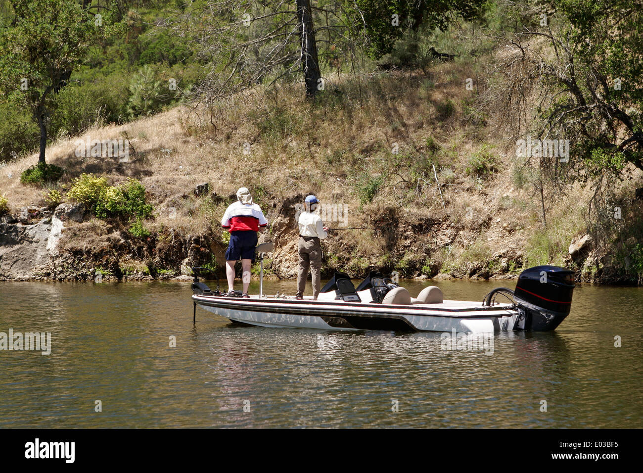 Two bass anglers in a boat fishing for largemouths at Santa Margarita ...