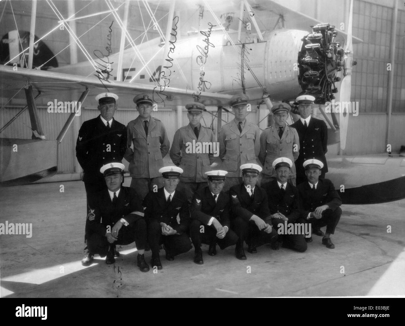 This group photo captures a diverse team of aviation professionals and ...