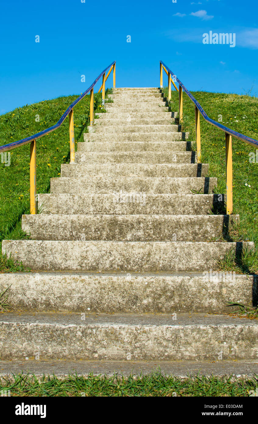 Outdoor Stairs Up A Small Grass Hill Stock Photo - Alamy