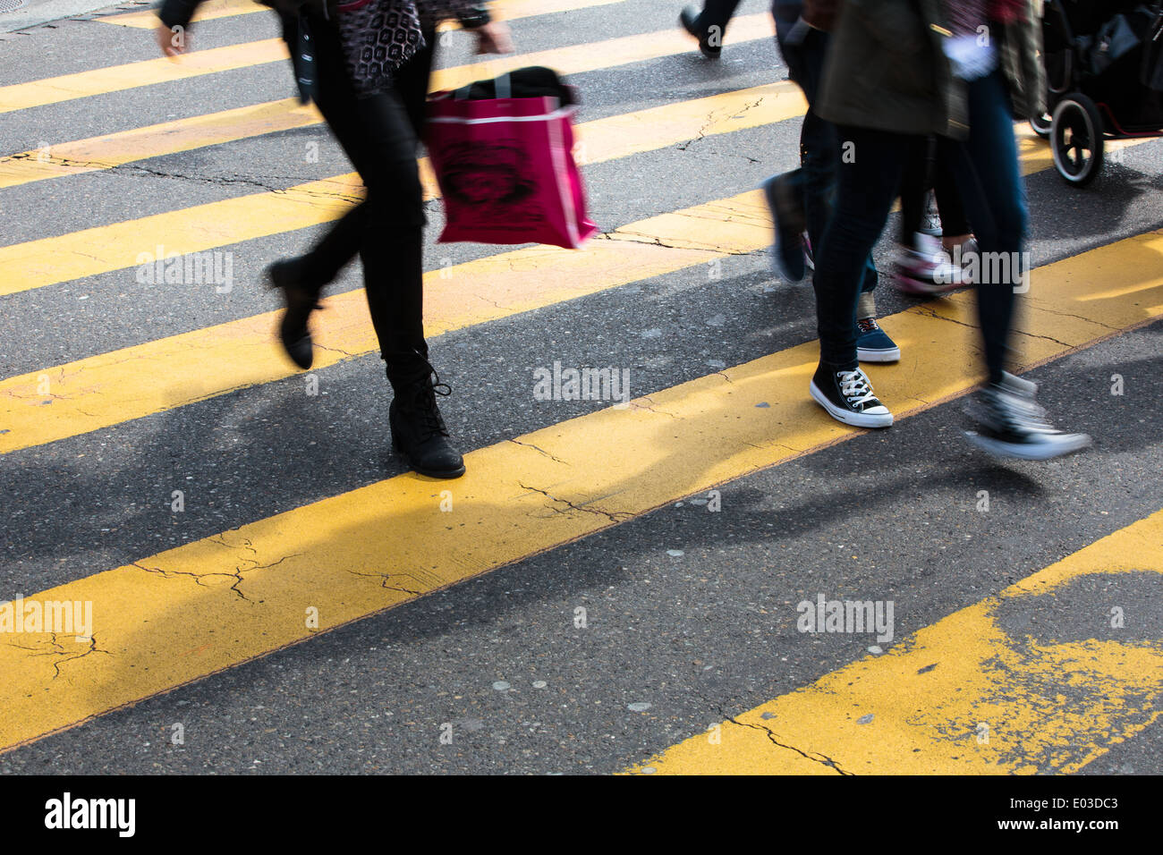 urban traffic concept - city street with a motion blurred crowd ...