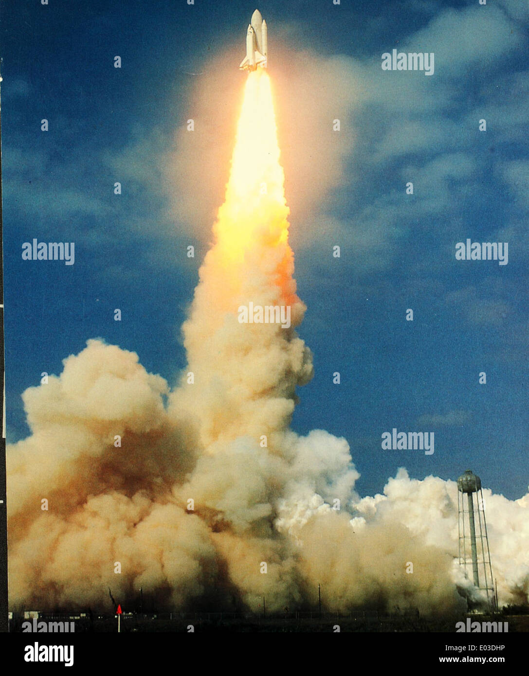 A glossy photograph from NASA’s Space Shuttle Program, capturing one of the space shuttle ...