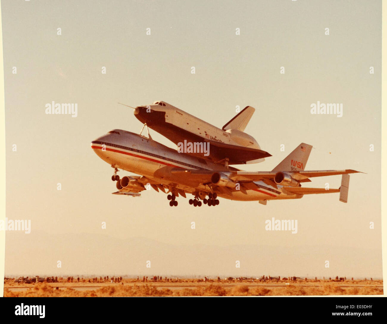 This glossy photograph from the NASA Space Shuttle Program captures the ...