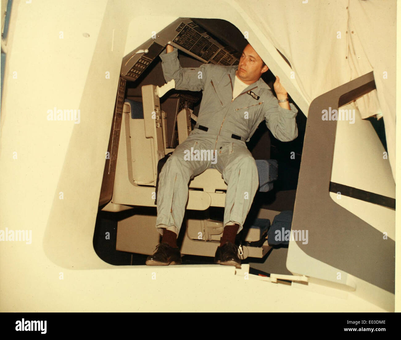 This glossy photo showcases the cockpit mock-up and fly-back booster of ...