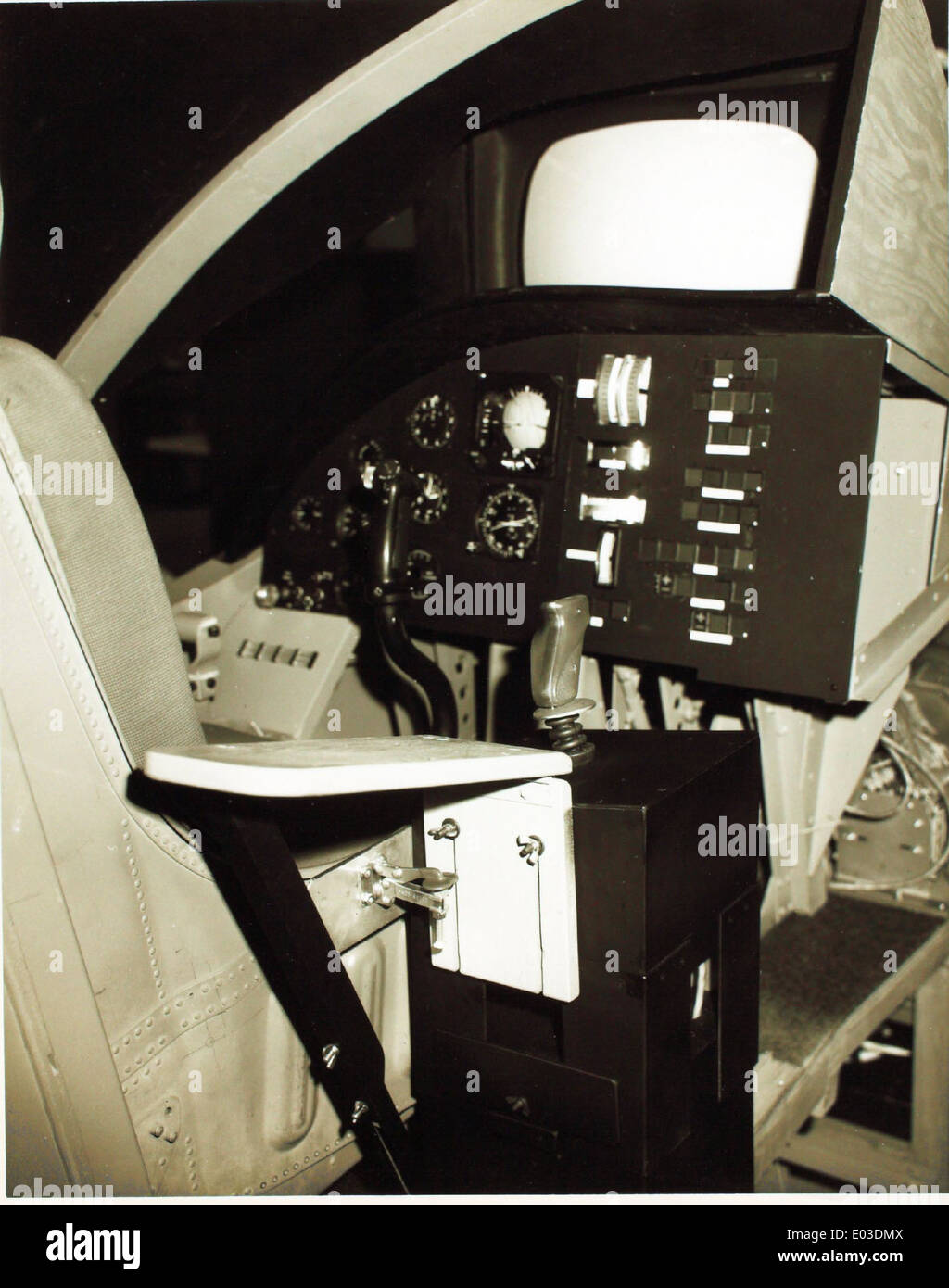 This glossy photo shows a mock-up of the Space Shuttle cockpit, used ...